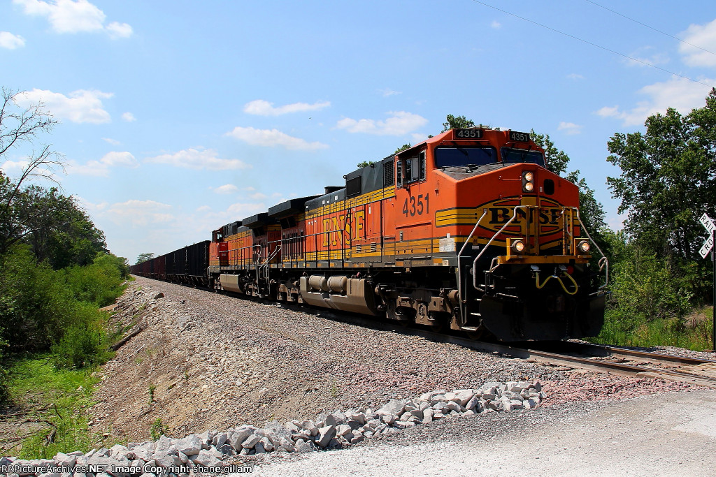 BNSF 4351 leads a ore train sb.